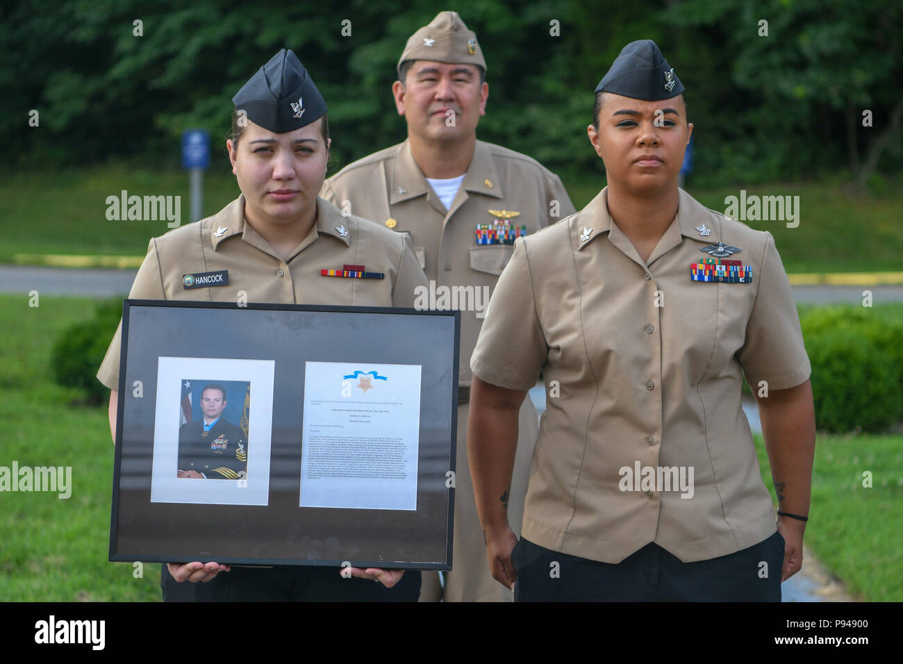 Petty Officer 3rd Class Morgan A. Hancock and Petty Officer 2nd Class ...