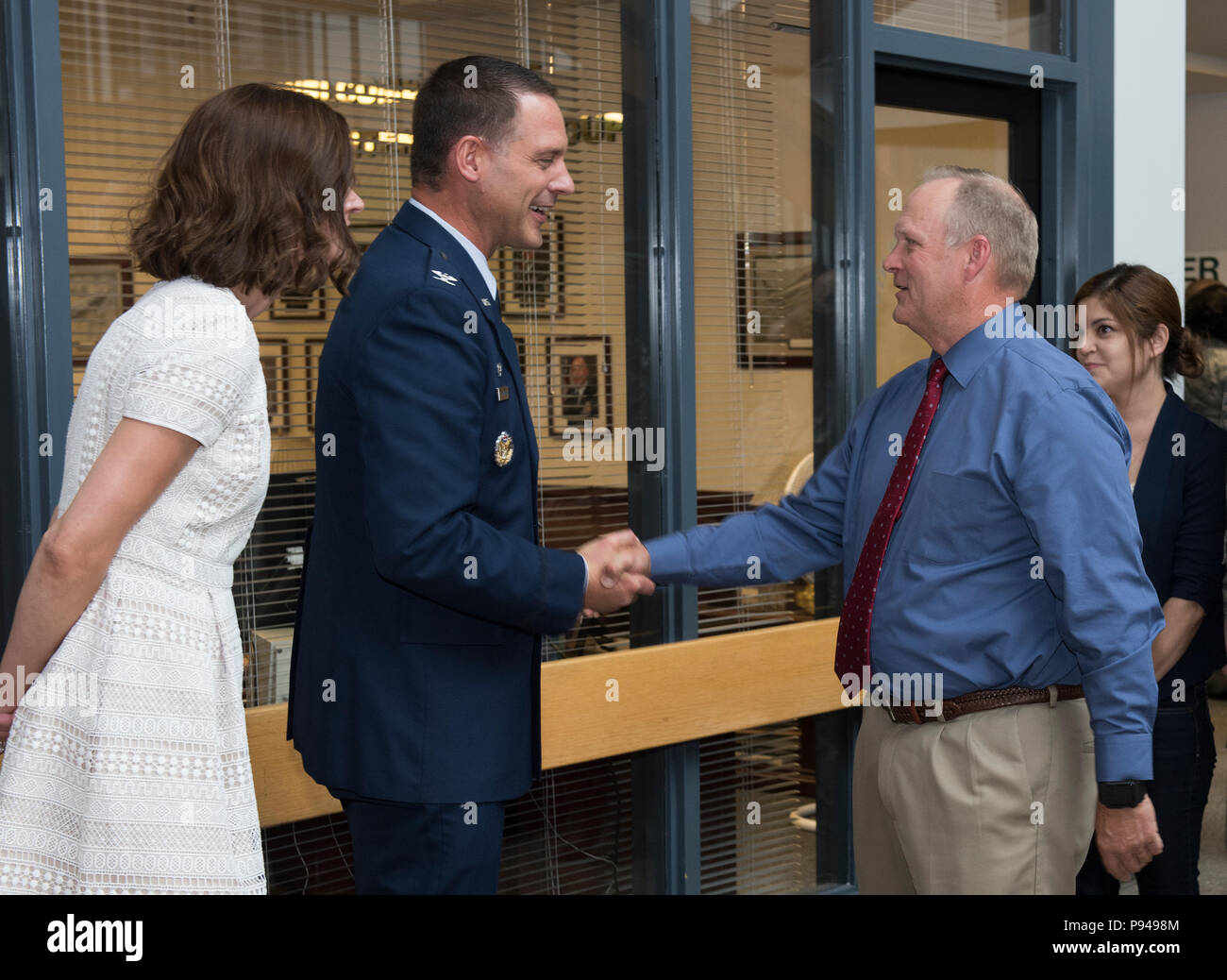 U.S. Air Force Col. Ethan Griffin and his wife Erin are greeted at a ...