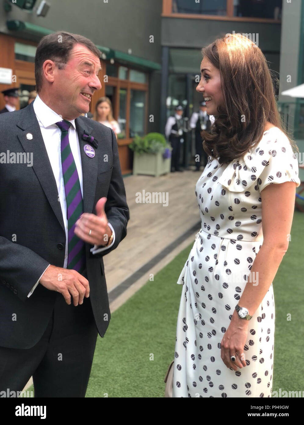 Chairman of the AELTC Philip Brook talks with the Duchess of Cambridge ...