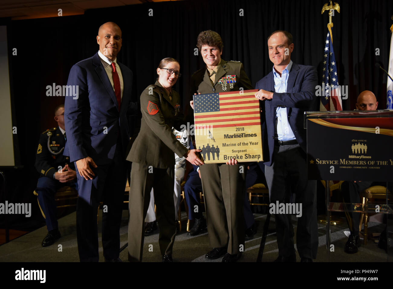 U.S. Marine Corps Sgt. Brooke Sharp poses for a photo with Lt. Gen ...
