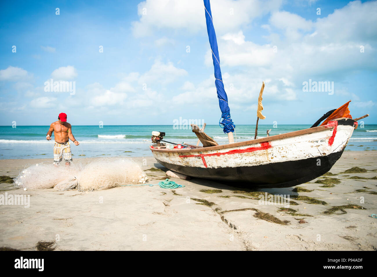 Traditional colorful brazilian fishing boat hi-res stock photography ...