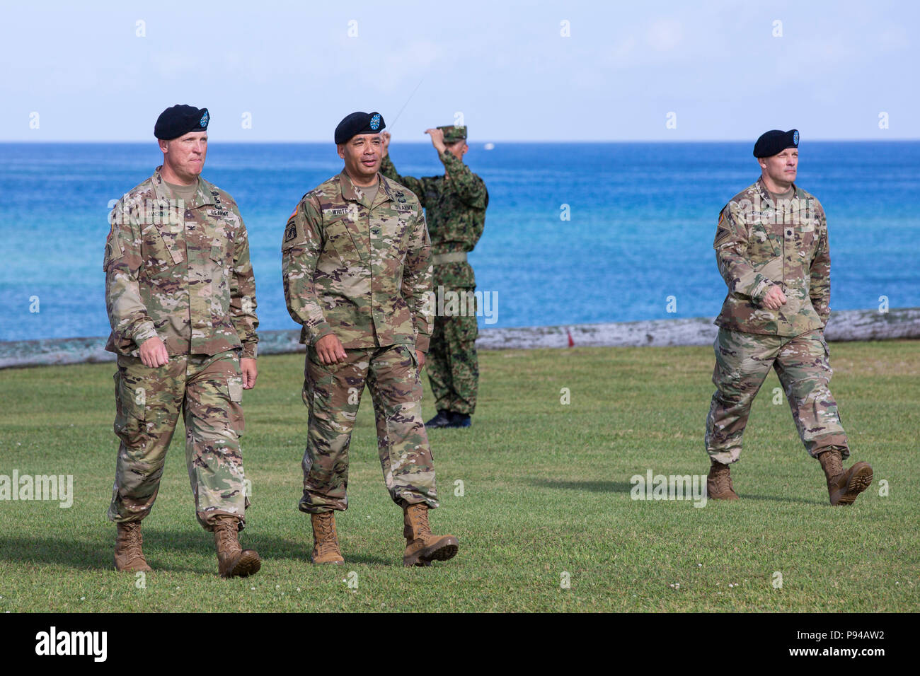 TORII STATION, OKINAWA, Japan – Col. Derek K. Jansen and Col. Theodore O. White march during the ...