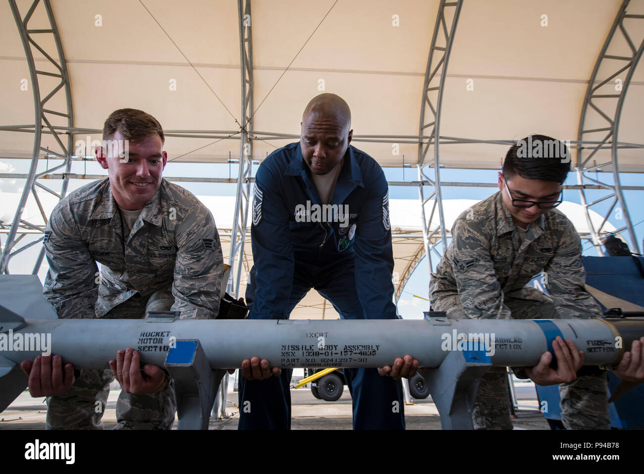 Lift an inert aim 9 air to air missile during an immersion tour hi-res ...