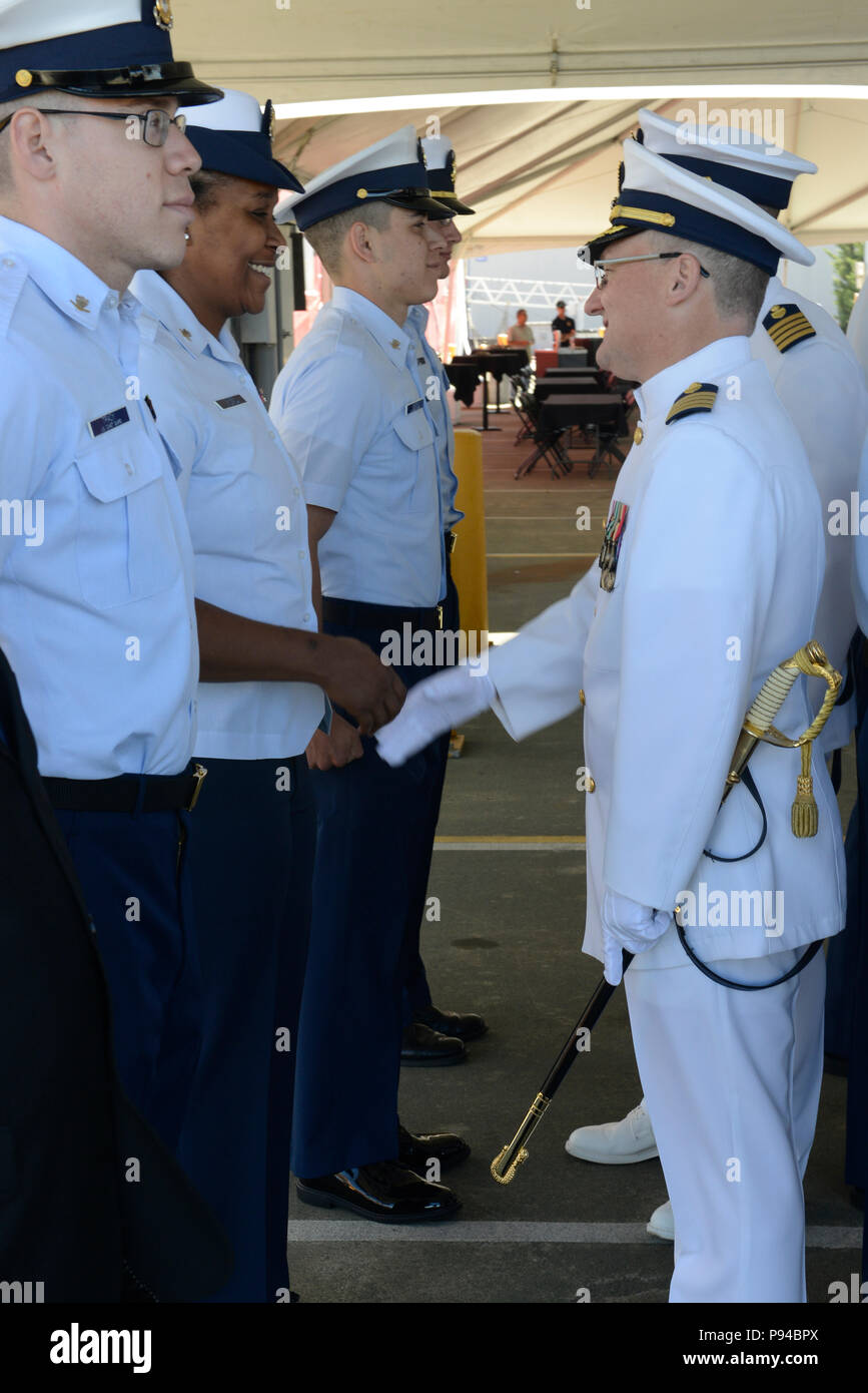 Capt. Stanley Romanowicz (right), off-going commanding officer of Coast ...