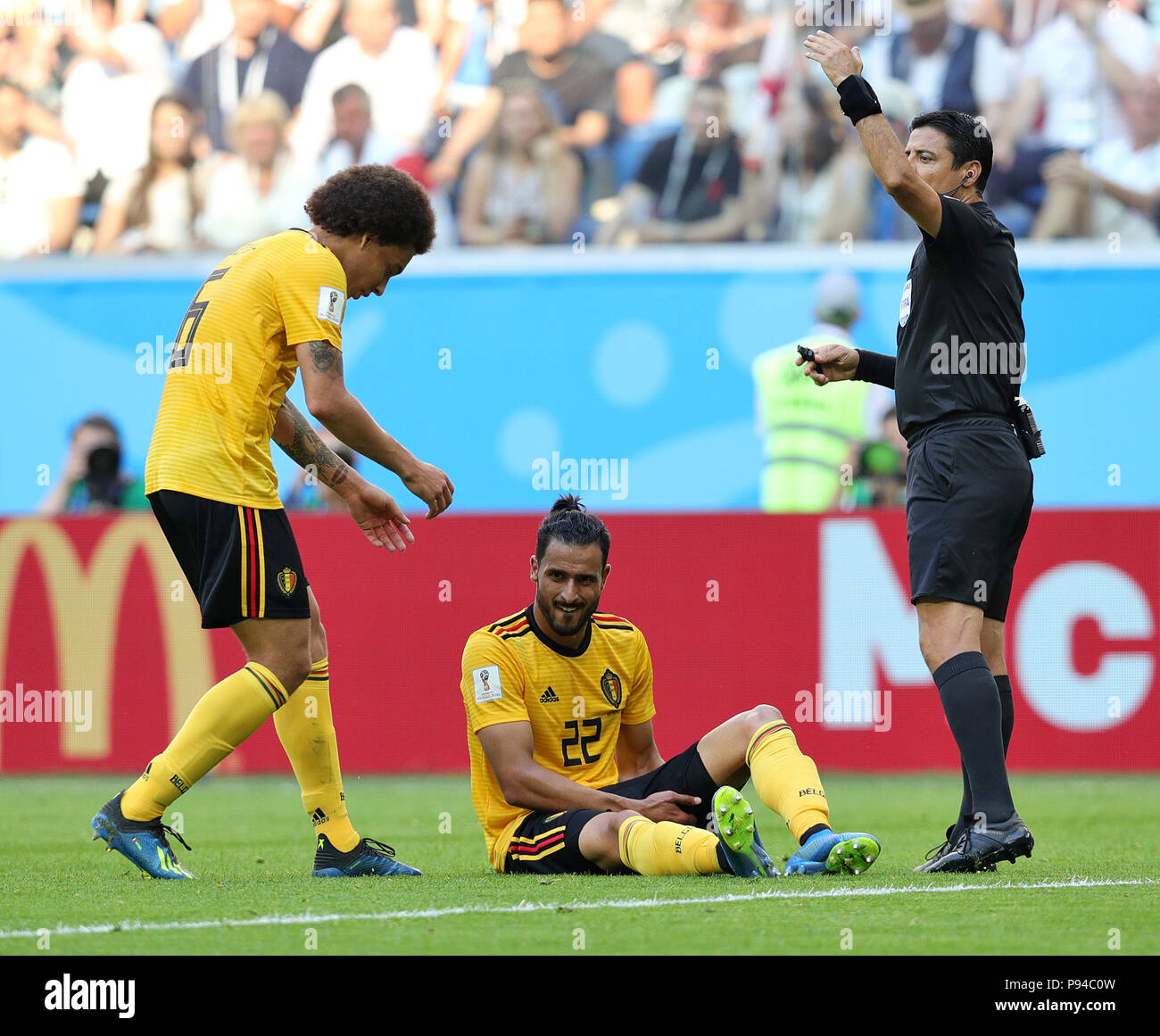 Belgium's Nacer Chadli pulls up with an injury during the FIFA World ...