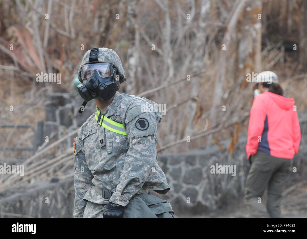 Capt. Darren Taylor, Task Force Hawaii Public Affairs Officer, escorts ...