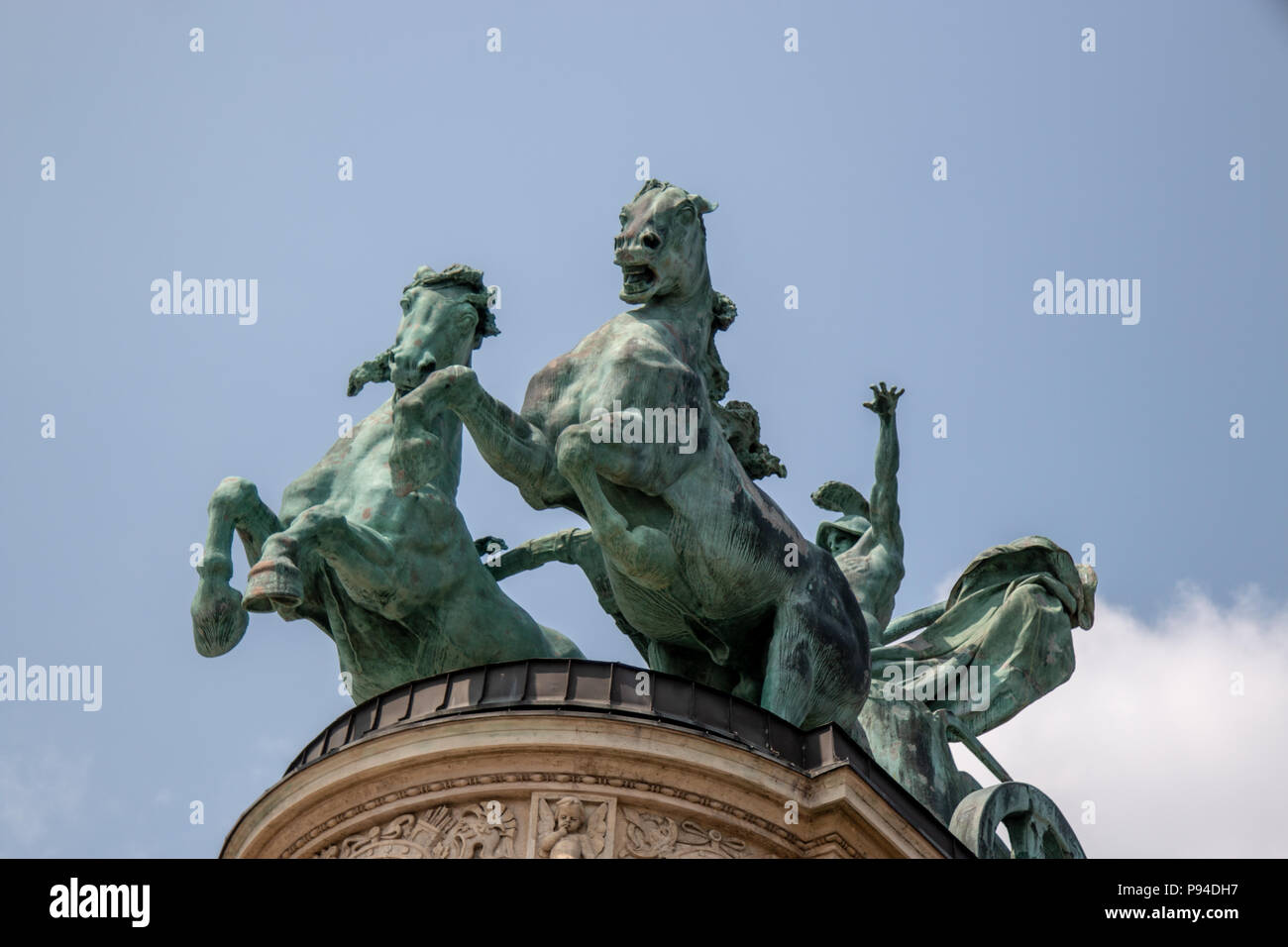 The statue of Man with a Snake representing War on top of the left ...