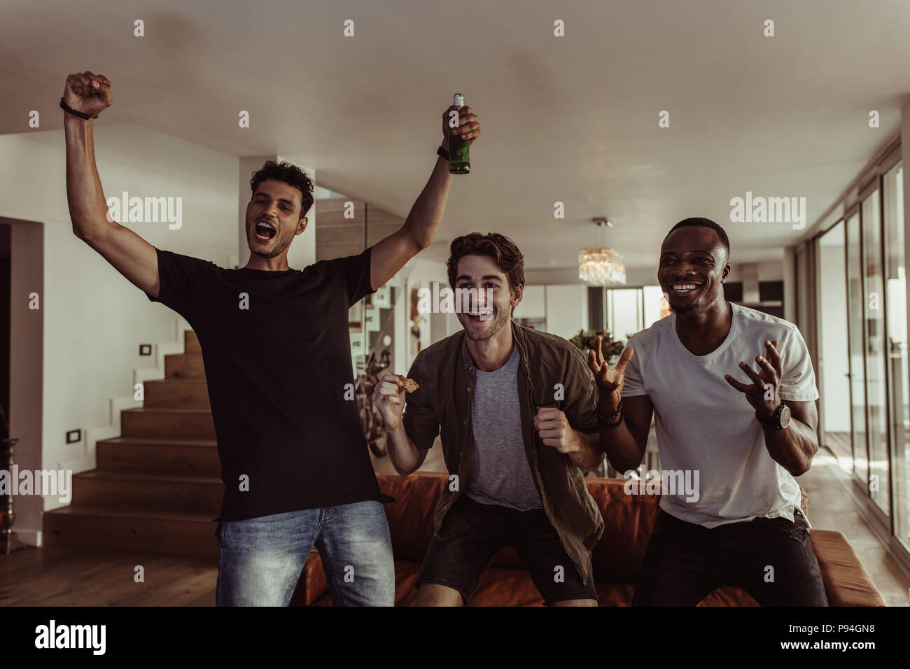 Three guys having fun in hi-res stock photography and images - Alamy