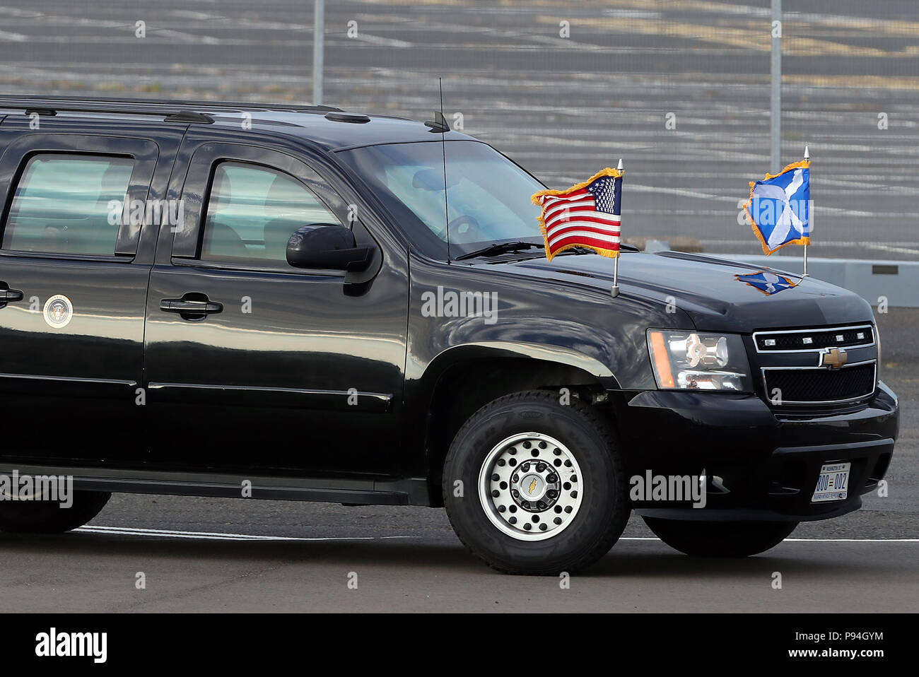 A US Presidential car flies the Saltire alongside the US flag as it ...