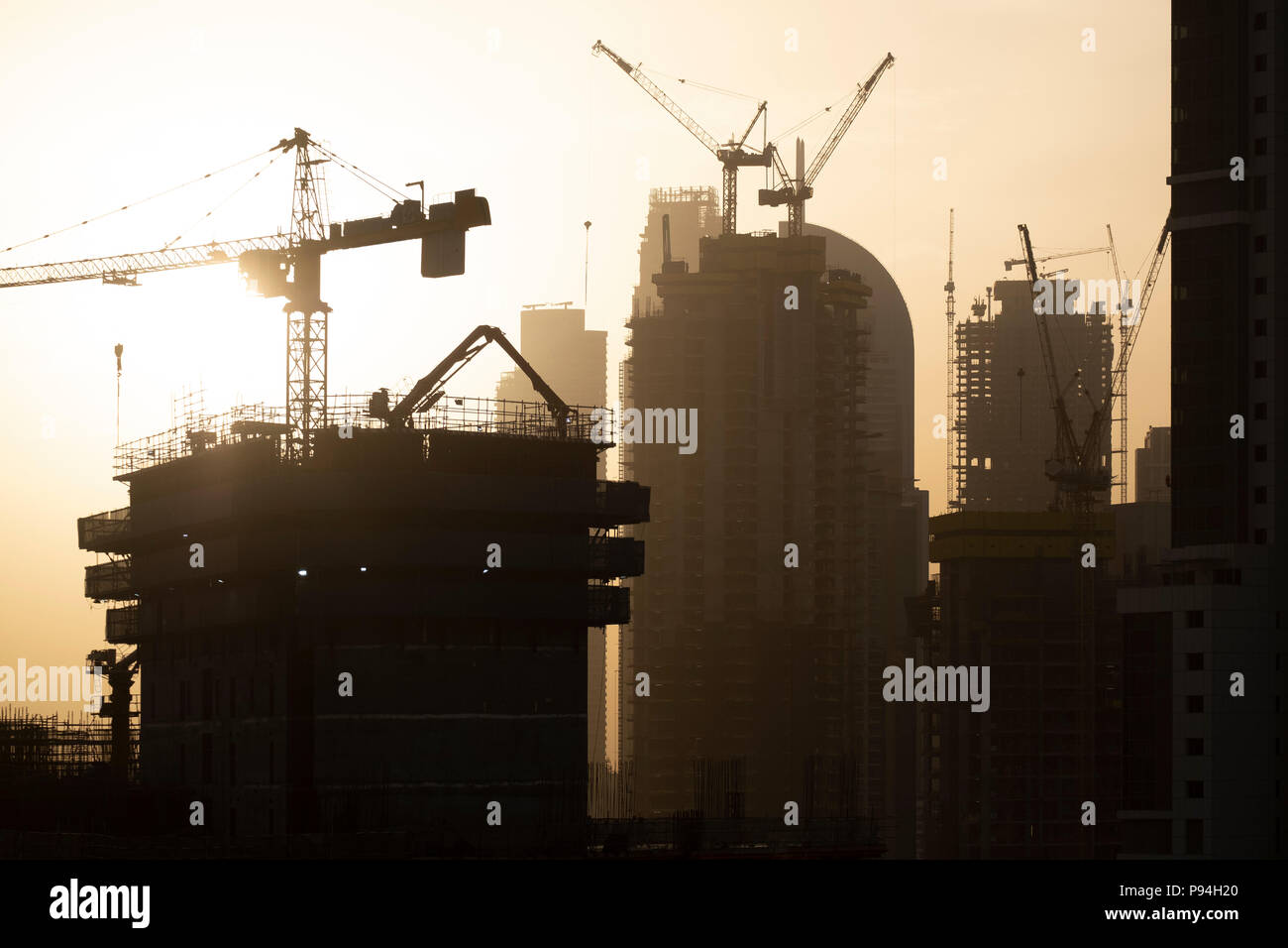 Silhouette construction crane hi-res stock photography and images - Alamy