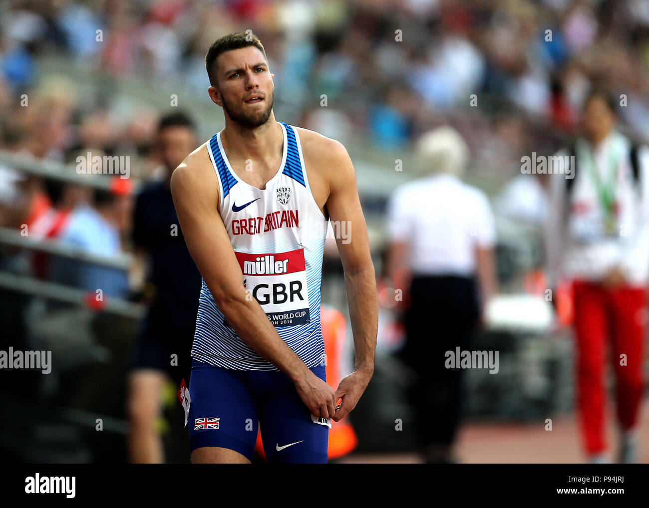 Great Britain's Andrew Pozzi looks dejected after failing to finish the ...