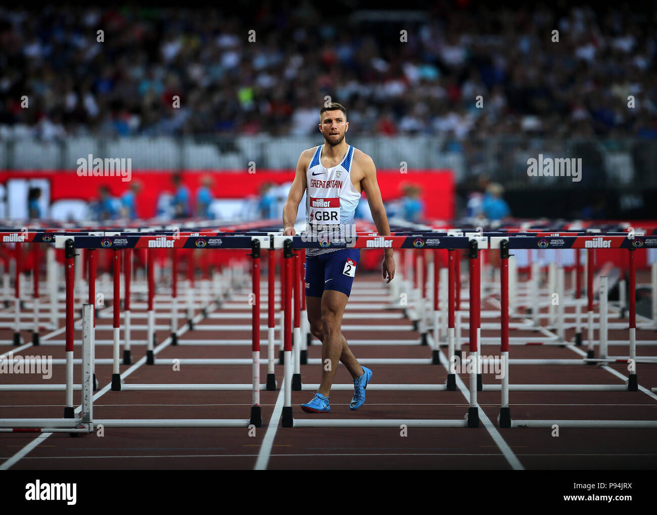 Great Britain's Andrew Pozzi looks dejected after failing to finish the ...