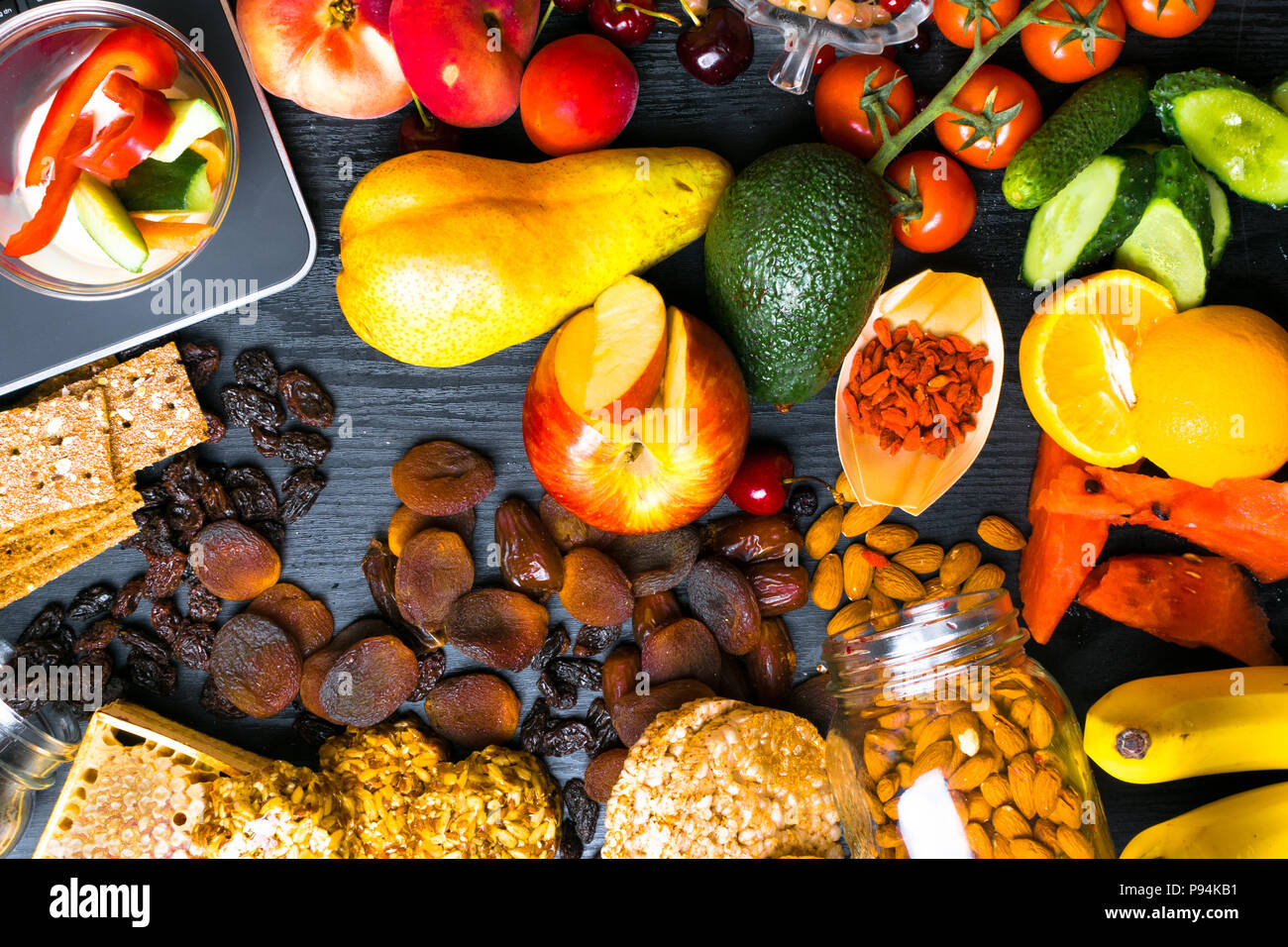 Healthy snack food on wooden table with notebook copy space, top view ...
