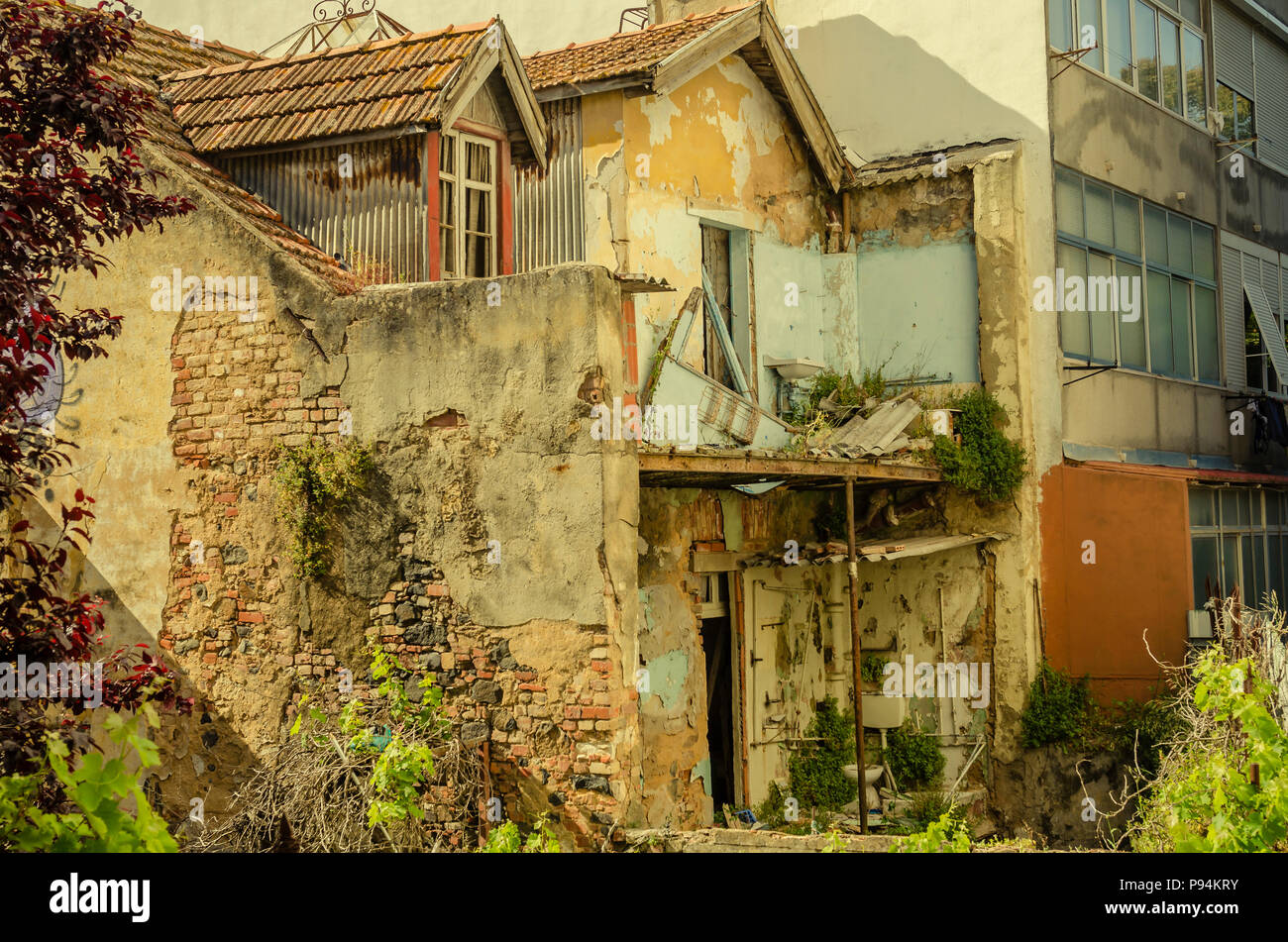 Landscape of ruined buildings at sunset, image of decrepitude or ...