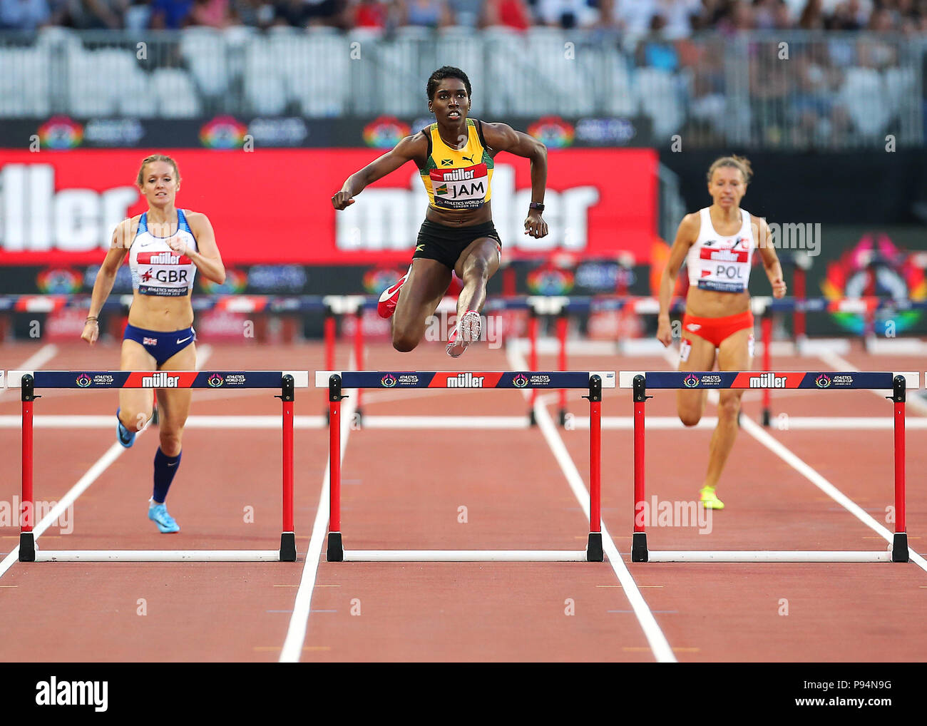 Jamaicas Janieve Russell wins the 400m Hurdles race during day one of ...
