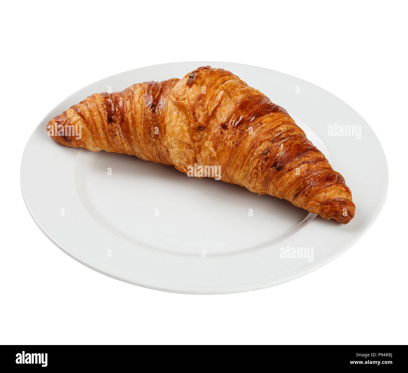 Croissant on plate isolated on white background. Include clipping path ...