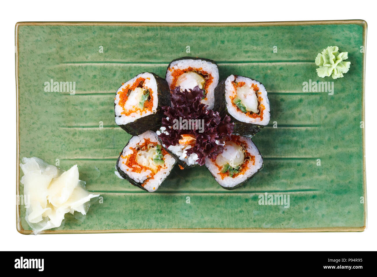 Sushi rolls with tuna and flying fish roe on a plate with wasabi and ...