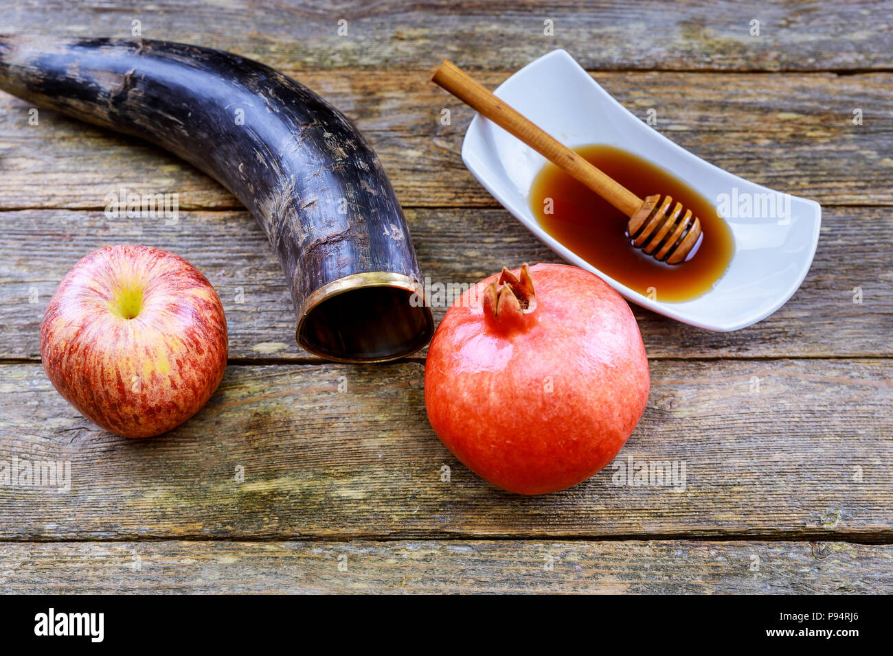 Shofar on a wood background - rosh hashanah Honey, apple and ...