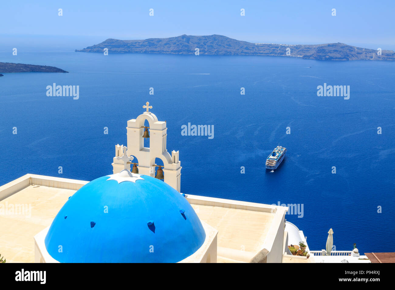 Three bells of Fira Church in Fira, Santorini island, Greece with ...