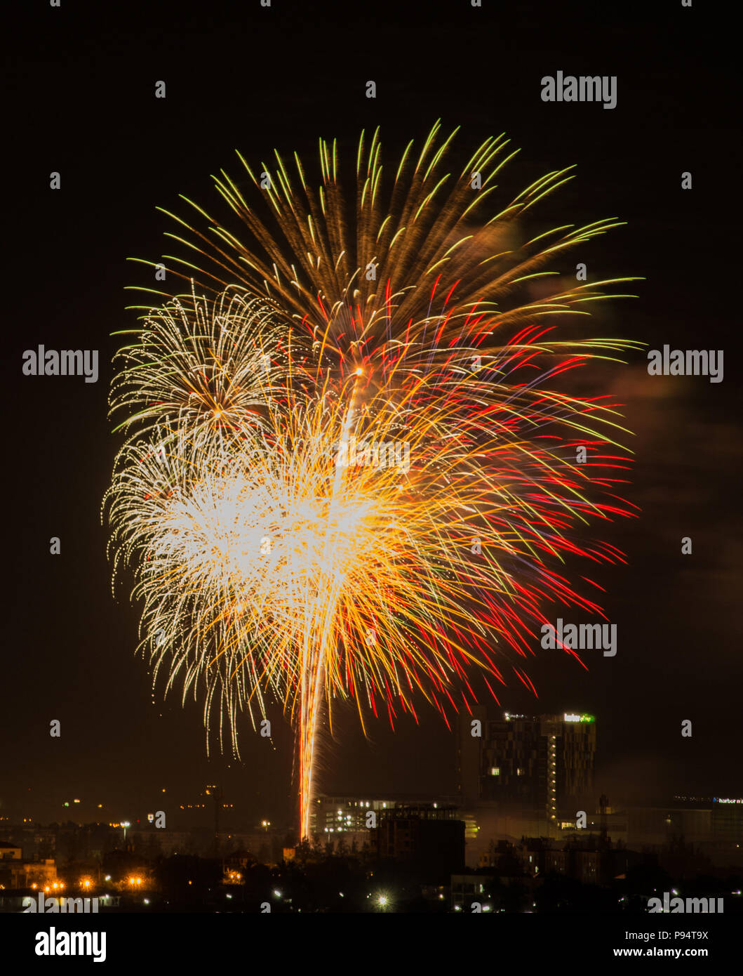 Colorful fireworks explosion in the dark sky Stock Photo - Alamy