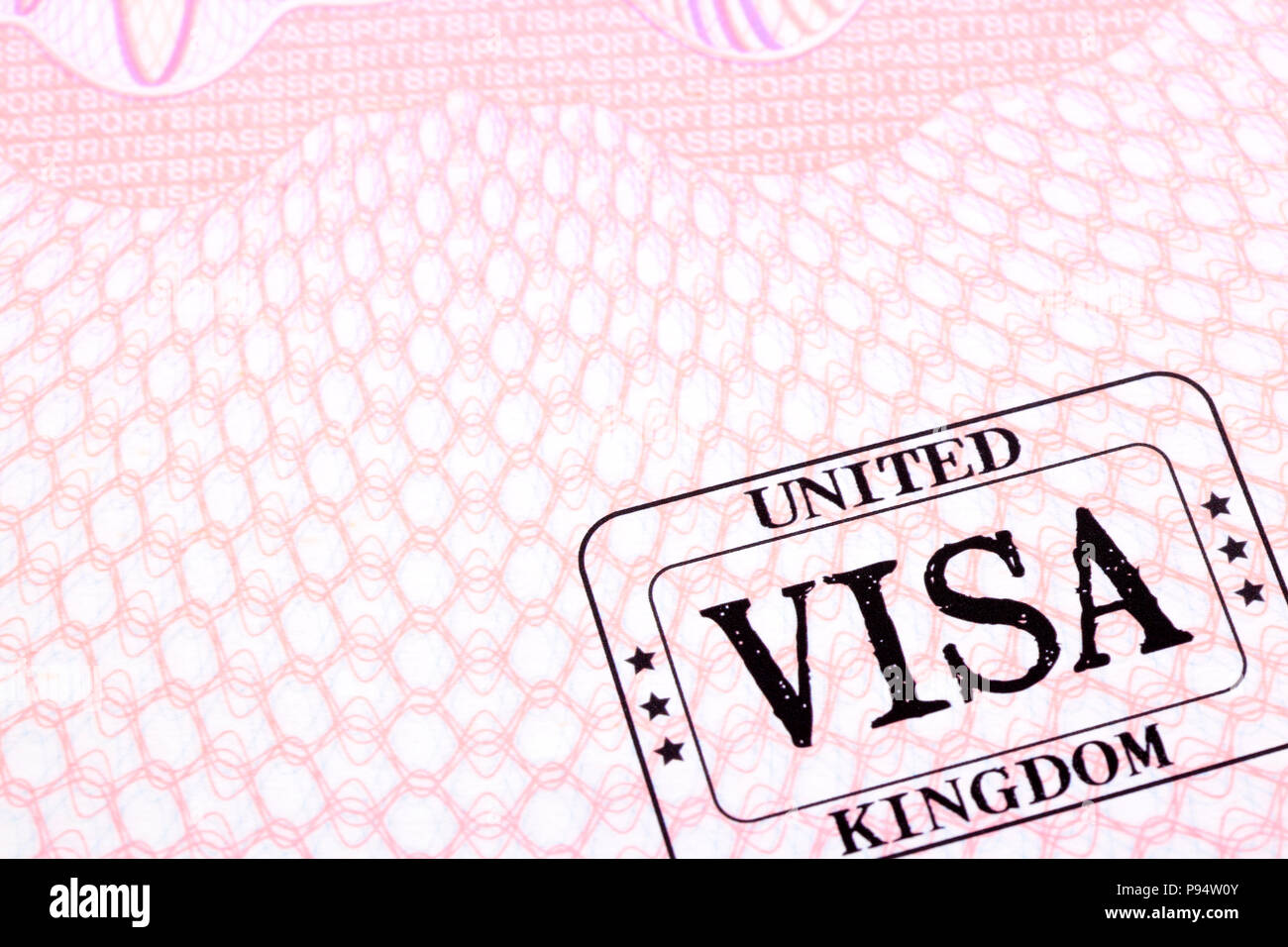 UK visa immigration stamp passport page close up, copy space Stock ...