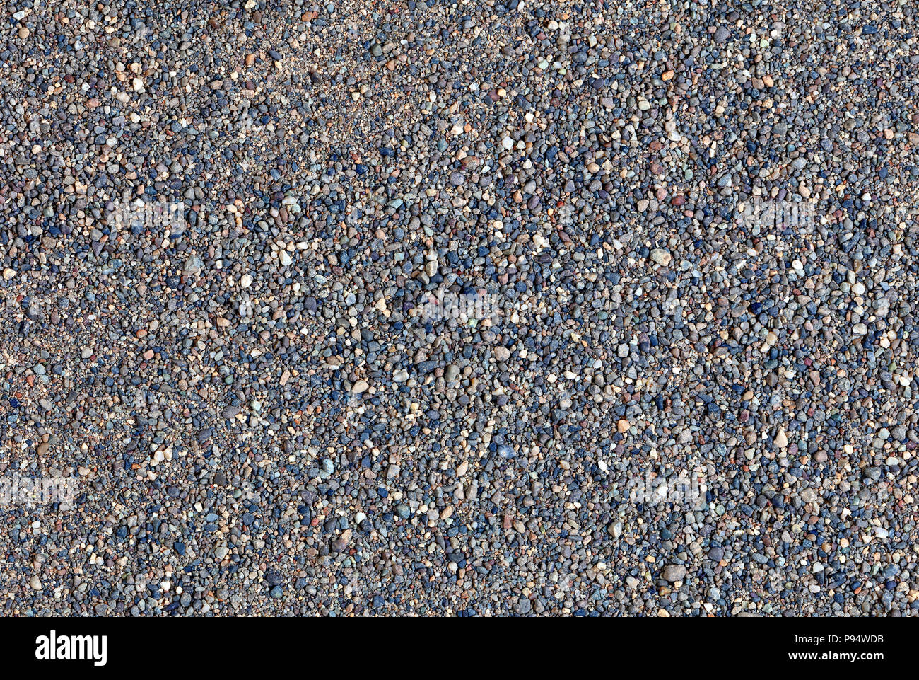 Sand with lots of stone Stock Photo - Alamy