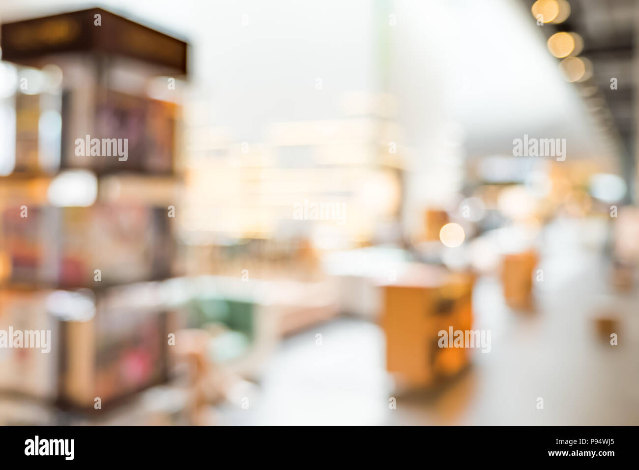 student walking in hallway of library with bookshelf library in ...