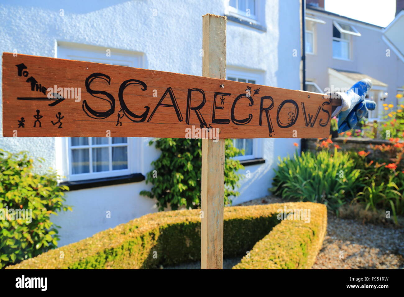 Musbury, UK, 14th July, 2018. Straw-filled frighteners around the ...