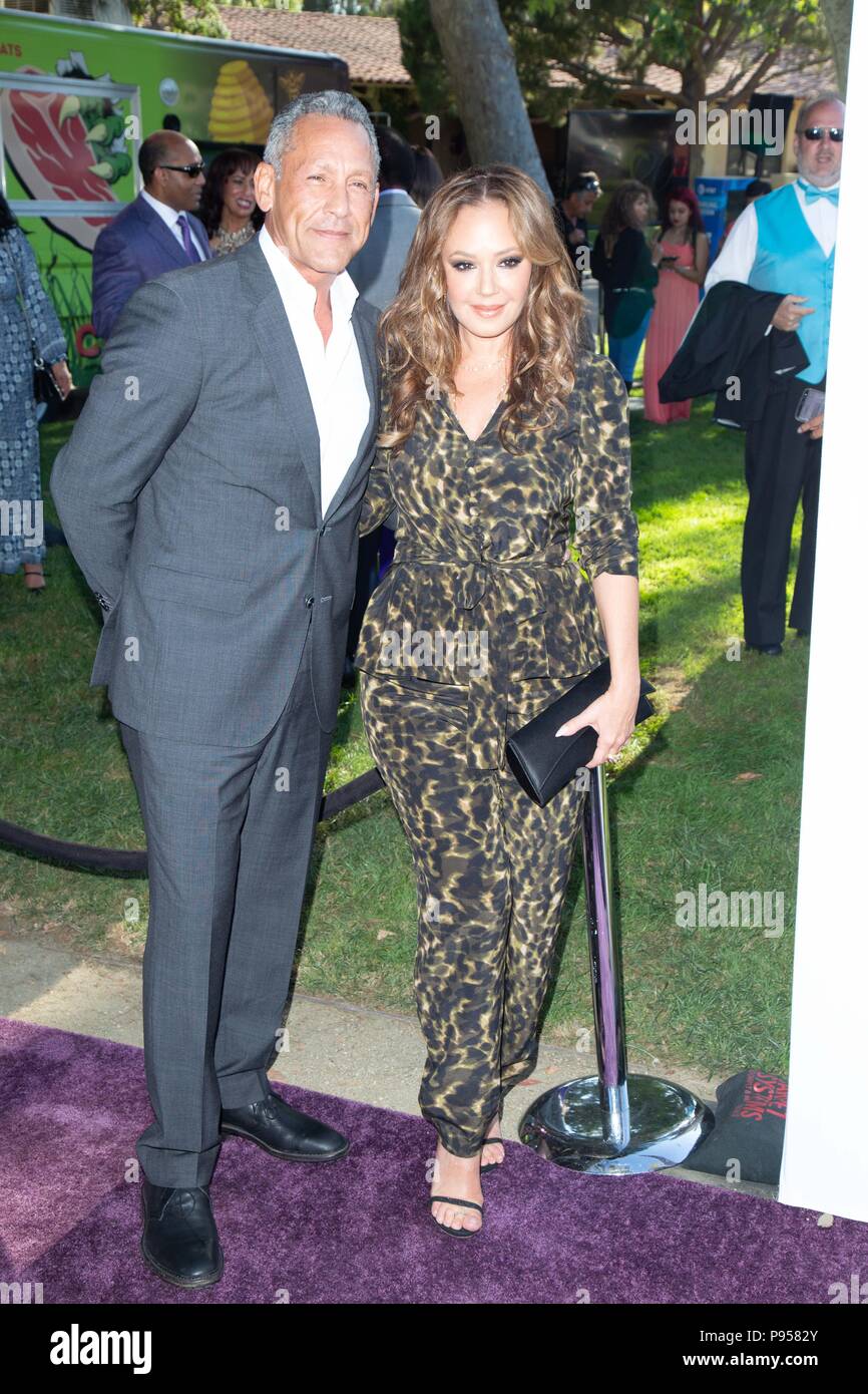 Malibu, USA. 31st Jan, 2018. Angelo Pagan and Leah Remini attend Holly ...
