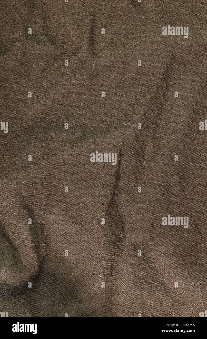 Brown wrinkled fabric texture. Closeup Stock Photo - Alamy