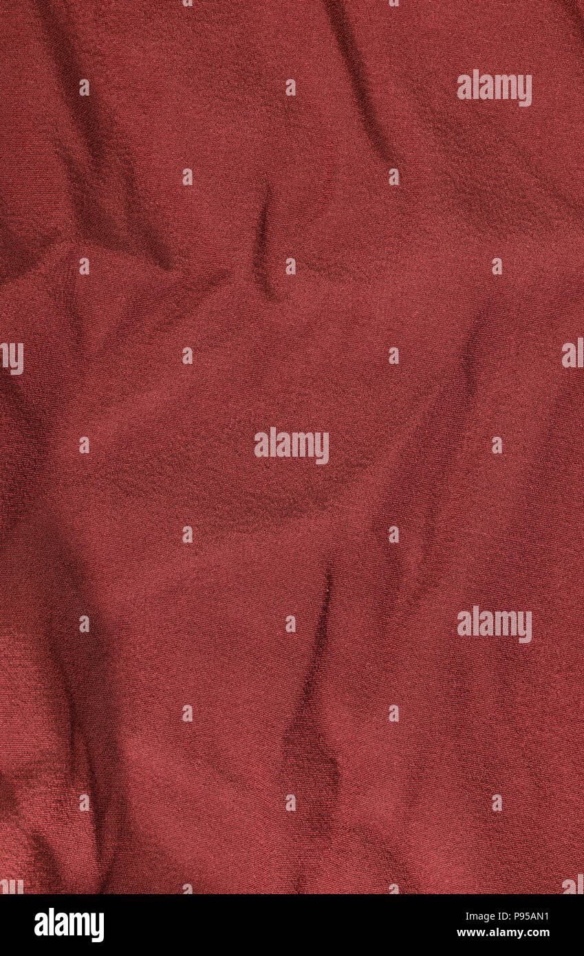 Red wrinkled fabric texture. Closeup Stock Photo - Alamy