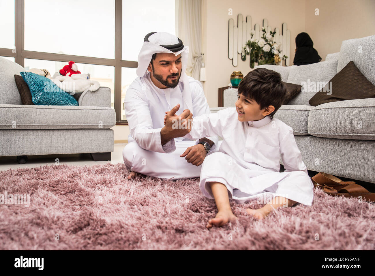Happy arabian family having fun at home Stock Photo - Alamy