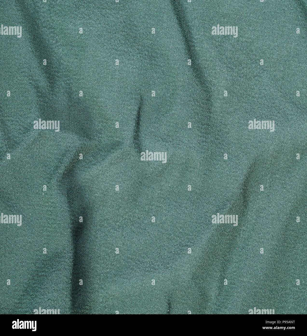 Green wrinkled fabric texture. Closeup square Stock Photo - Alamy