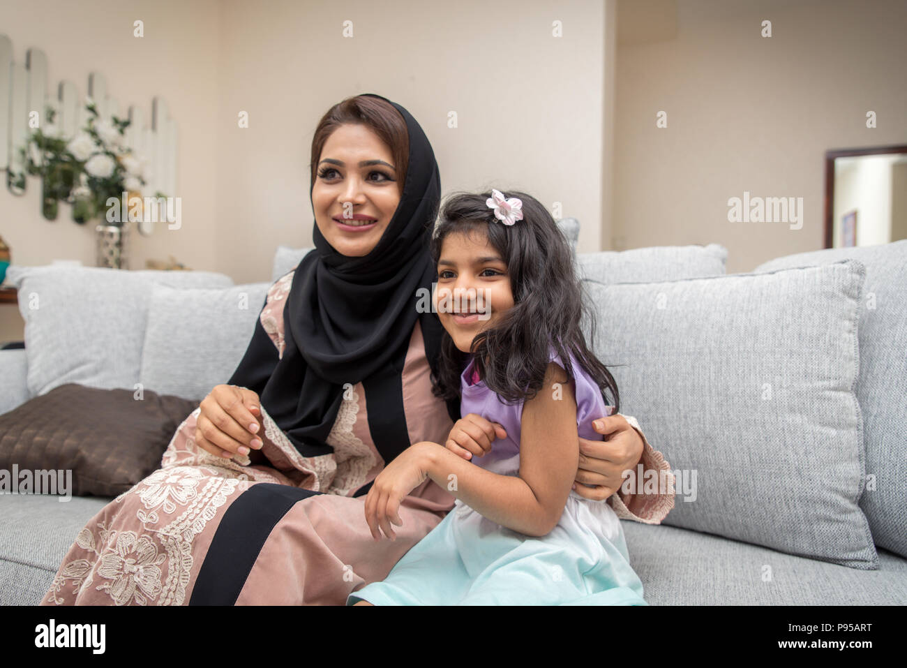 Happy arabian family having fun at home Stock Photo - Alamy