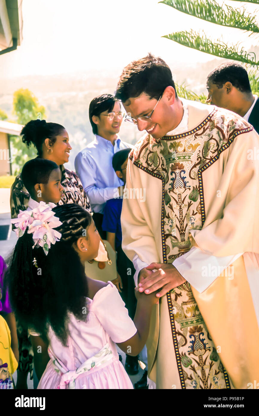 Catholic priest greeting parishioners after hi-res stock photography ...