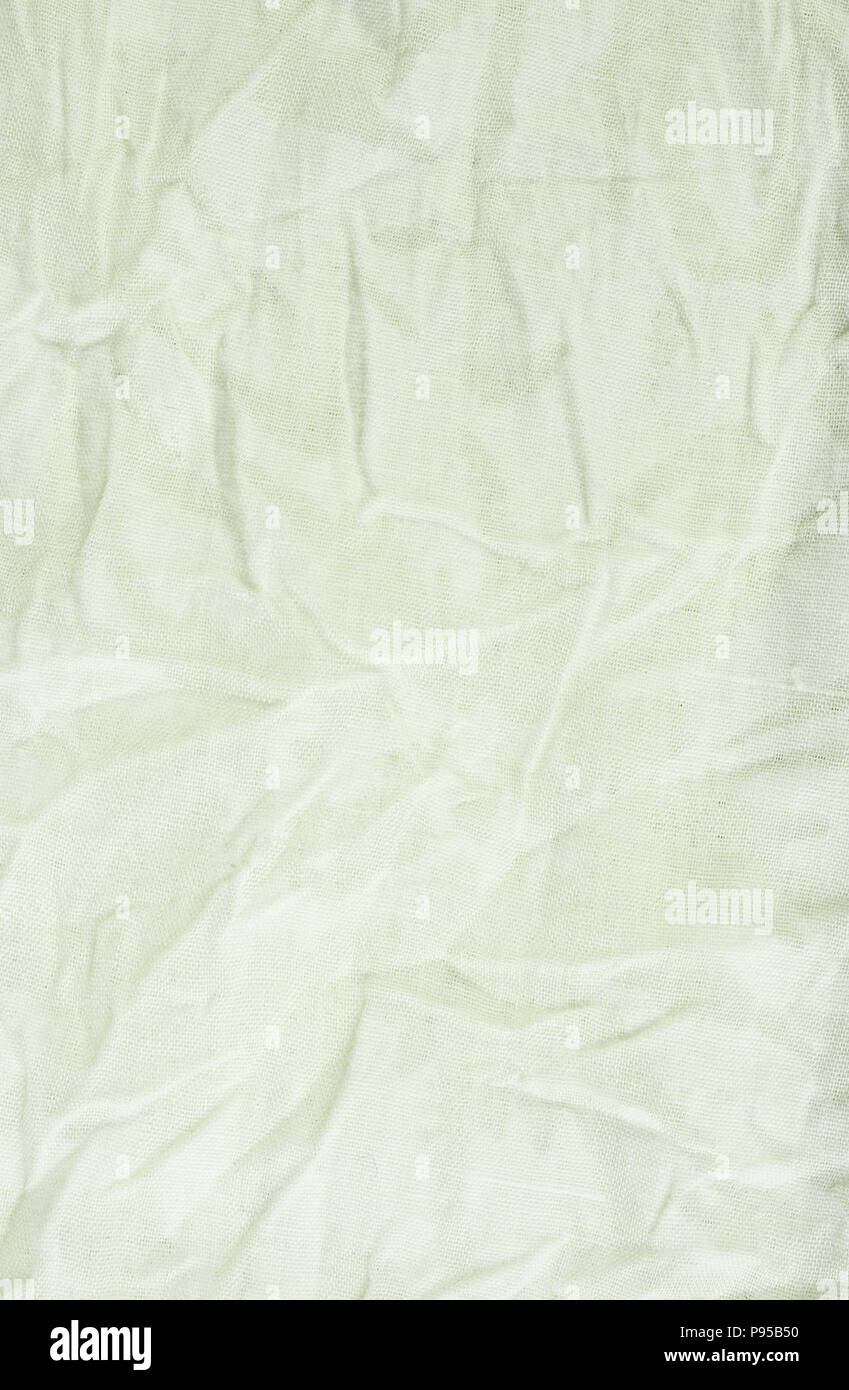 Yellow wrinkled fabric texture. Closeup Stock Photo - Alamy