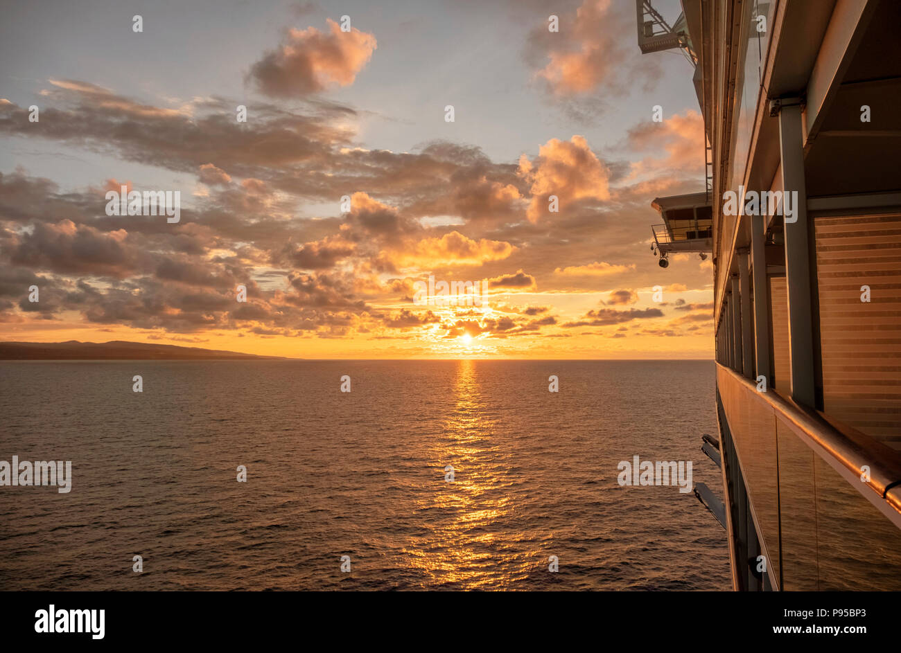 Cruise ship sailing towards a magnificent sunset Stock Photo - Alamy