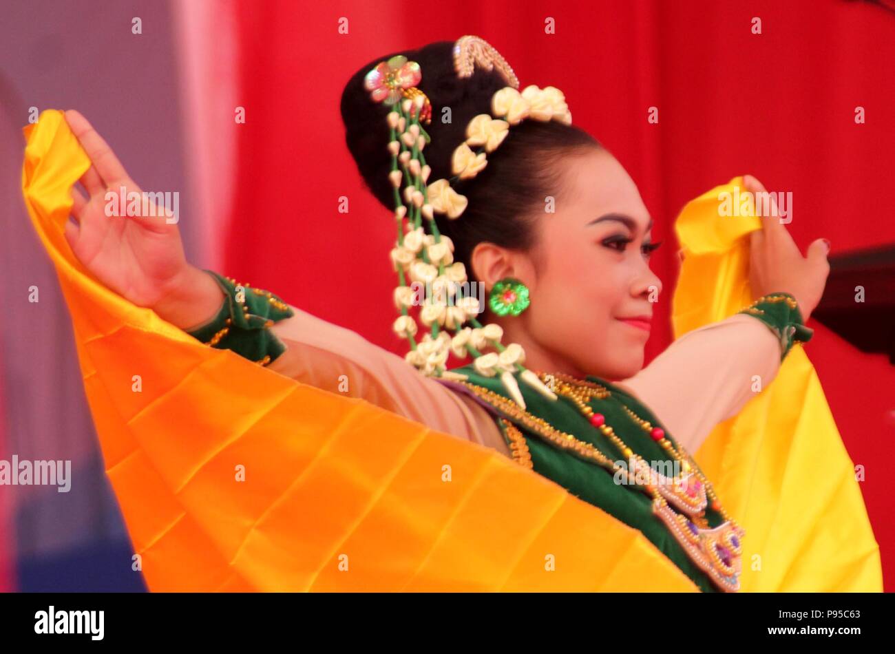 Madiun, Indonesia. 13th July, 2018. A number of people wearing costumes ...