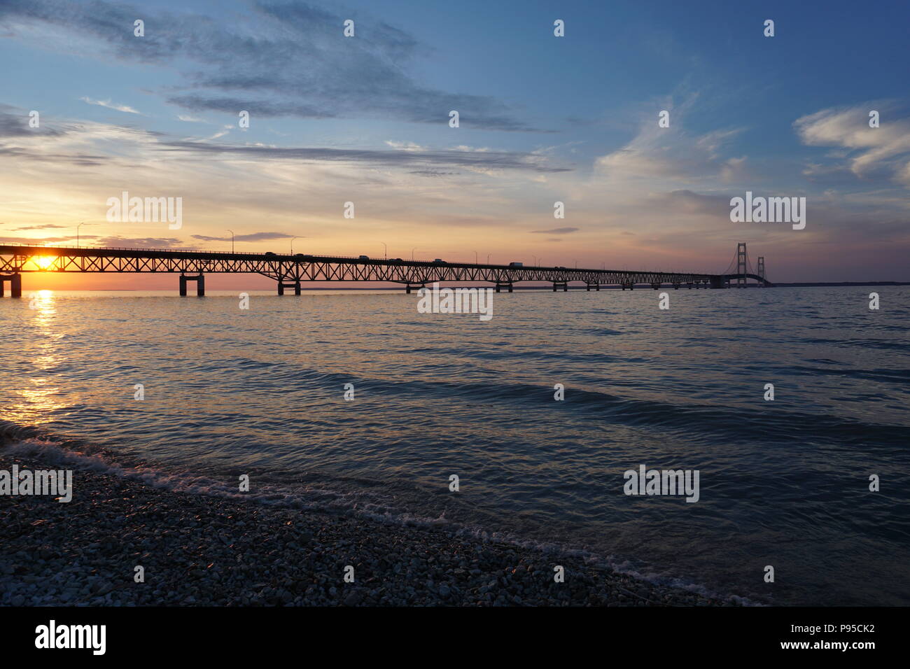 A perfect sunset by the bridge Stock Photo - Alamy