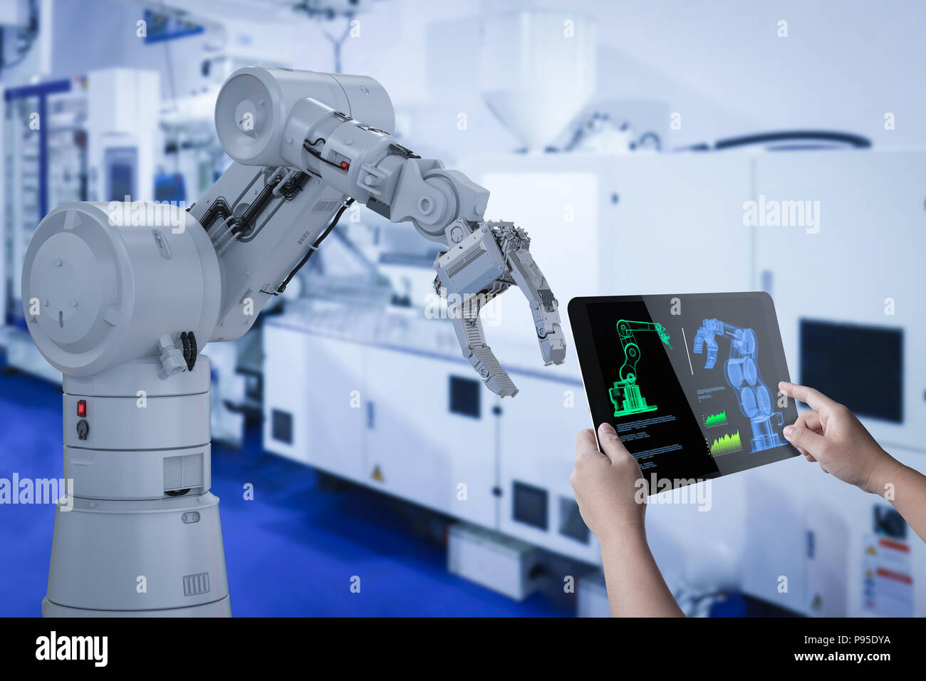 Technician control 3d rendering robot arm in factory Stock Photo - Alamy