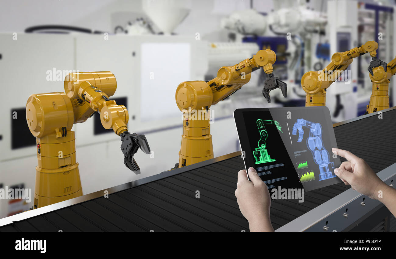 Technician control 3d rendering robot arm in factory Stock Photo - Alamy