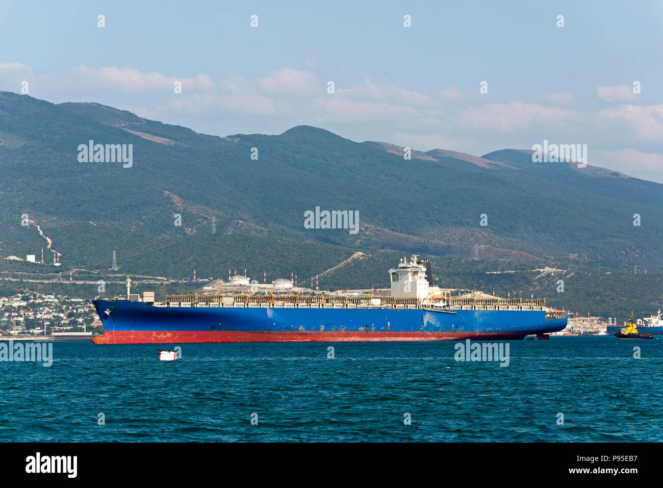 Cargo ship anchored in the roadstead Tsemes bay at the entrance of the ...