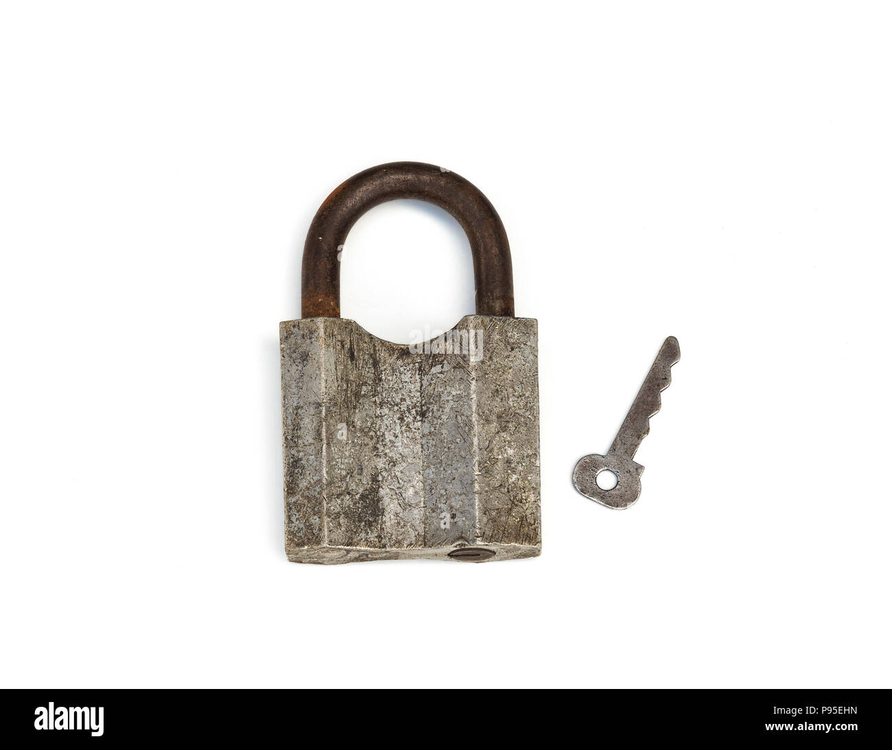 Hinged closed metal lock with key on white background Stock Photo - Alamy