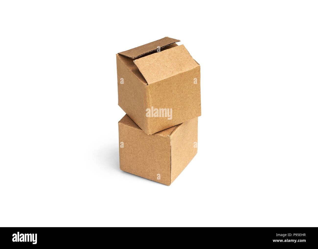Two cardboard square boxes stand one on top of another on a white ...