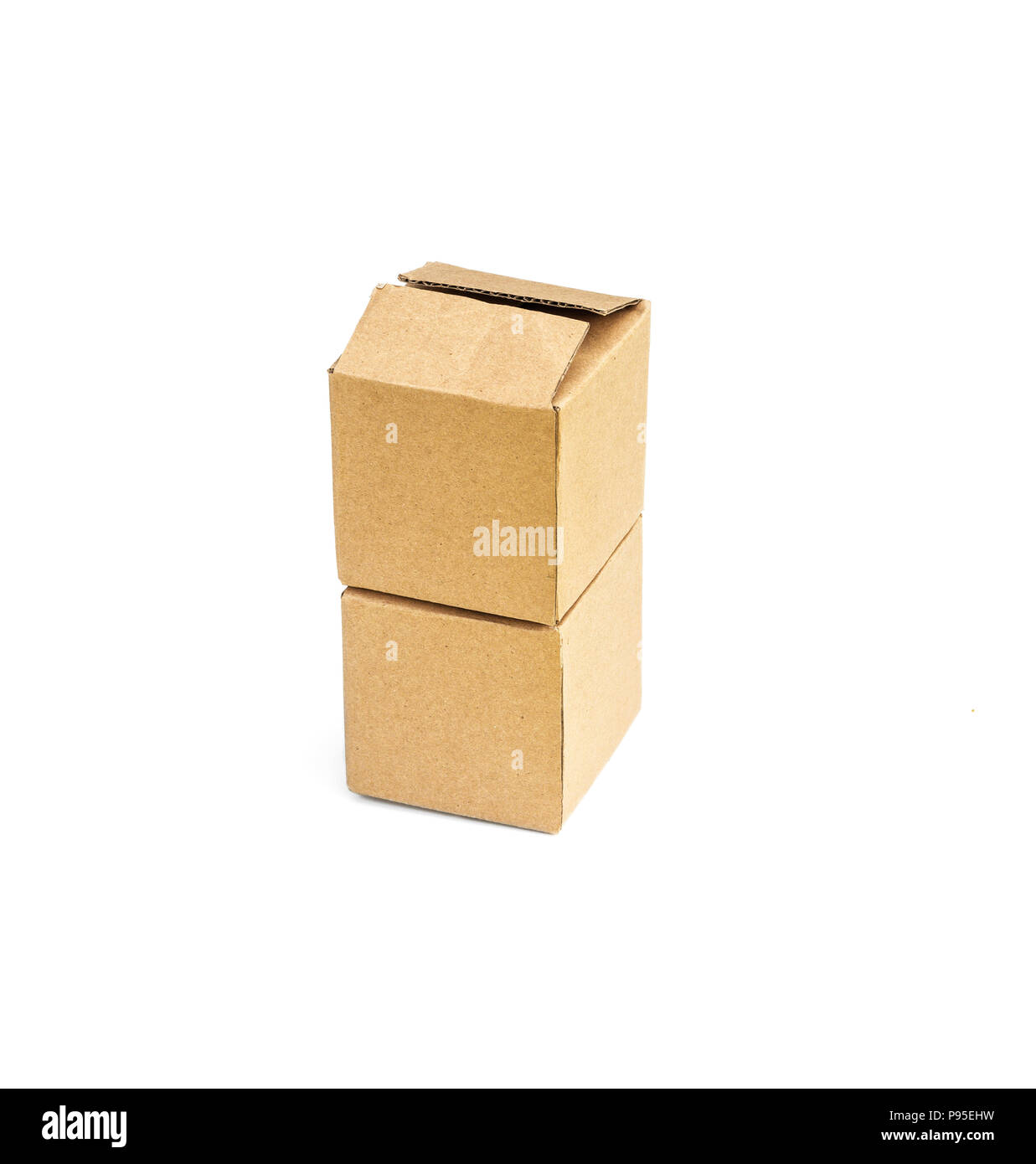 Two square cardboard boxes stand one on top of another on a white ...