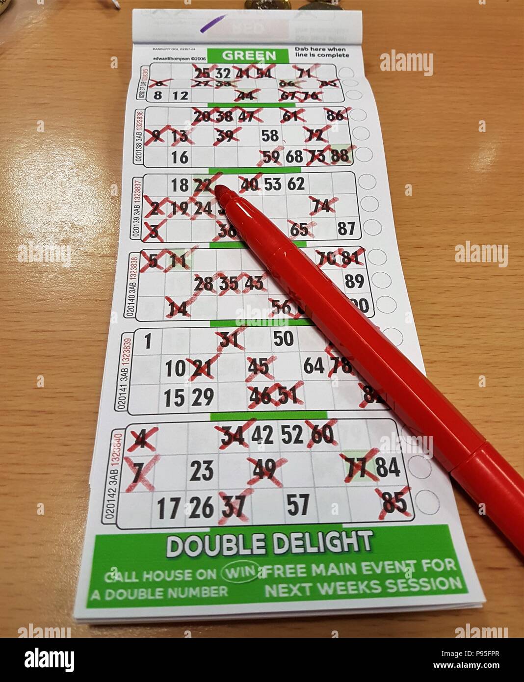 Bingo tickets and marker pens Stock Photo - Alamy