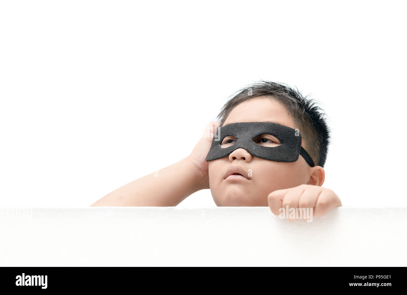 masked child appeared from below with an expression of surprise ...