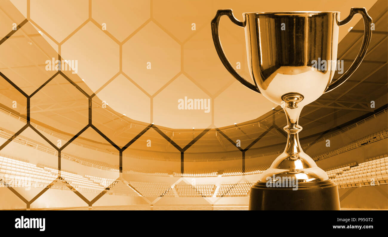Gold theme trophy with background fade hexagon pattern on stadium,win ...