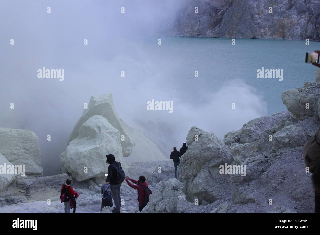 Mt Ijen crater mining colony east Java Indonesia at dawn Stock Photo ...