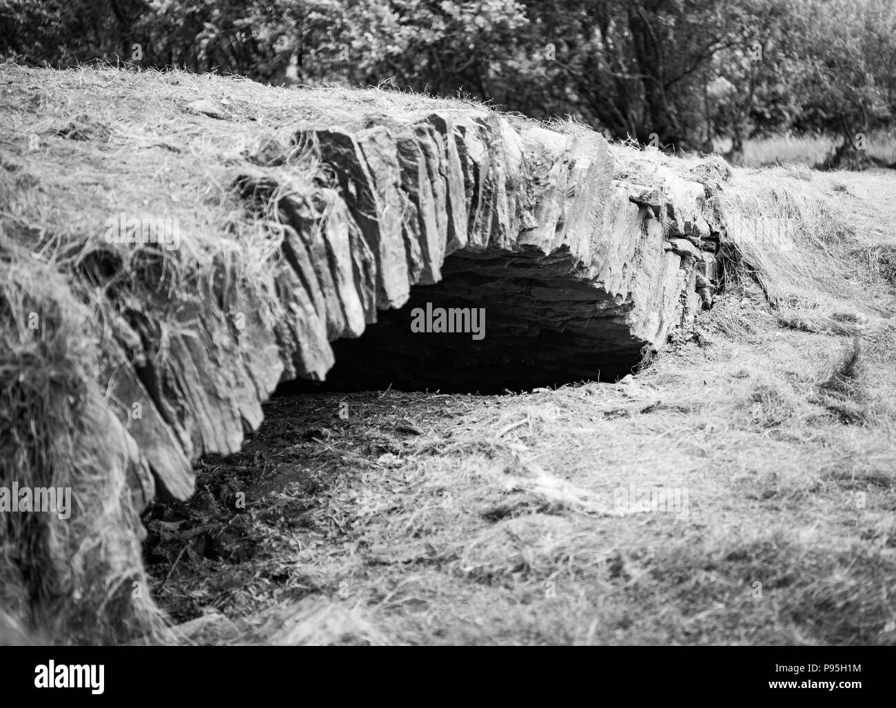 Old stone bridge uncovered by dry weather at Injebreck reservoir Stock ...